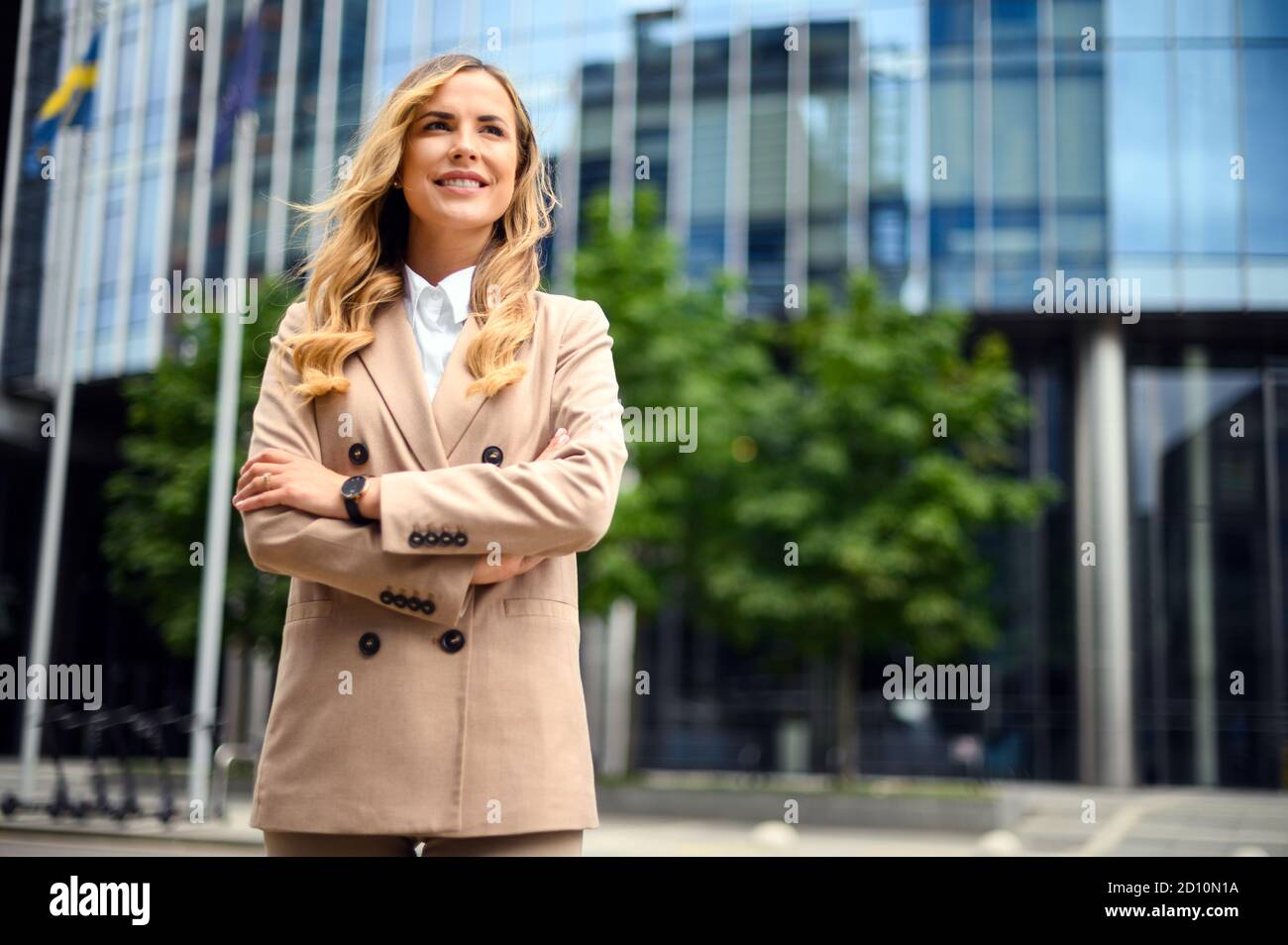 Confident young female manager outdoor in a modern urban setting Stock ...