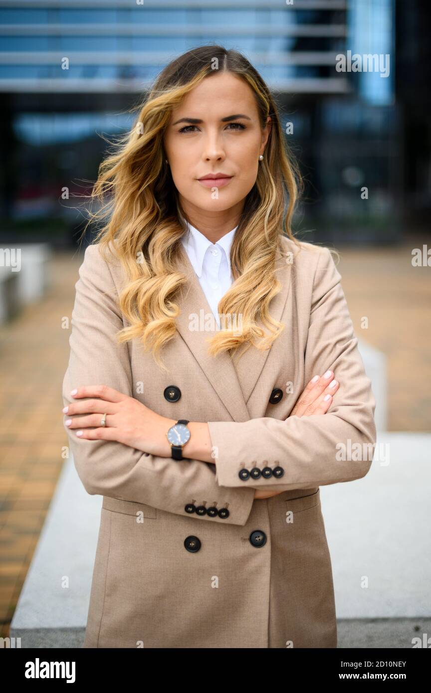 Confident young female manager outdoor in a modern urban setting Stock ...