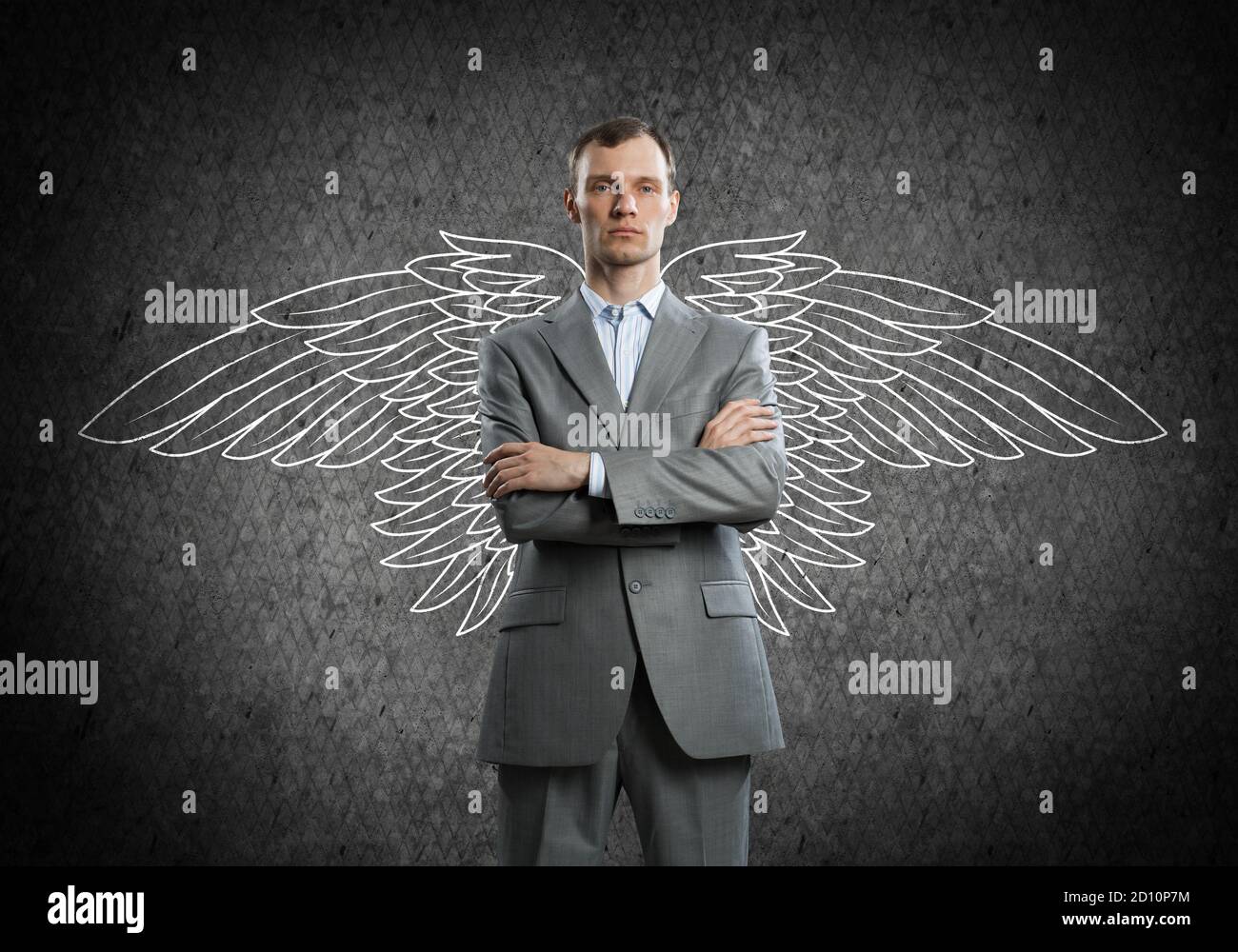 Businessman with wings Stock Photo - Alamy