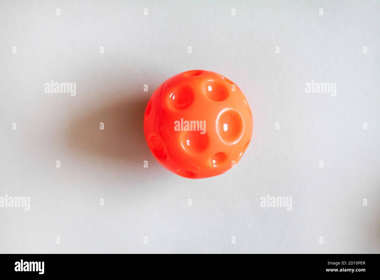 Red Plastic ball as virus on the gray background, medical concept Stock ...