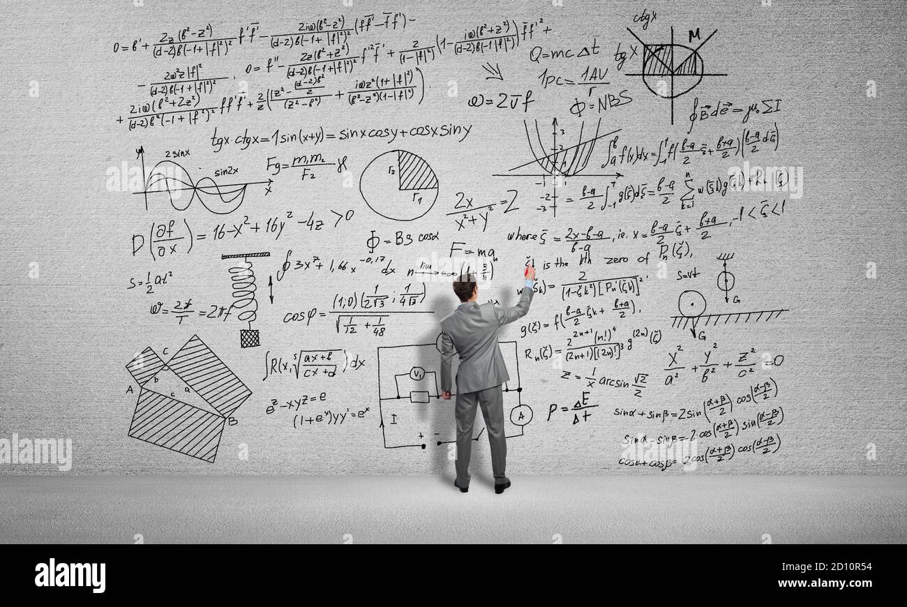 Man draw science formulas Stock Photo - Alamy