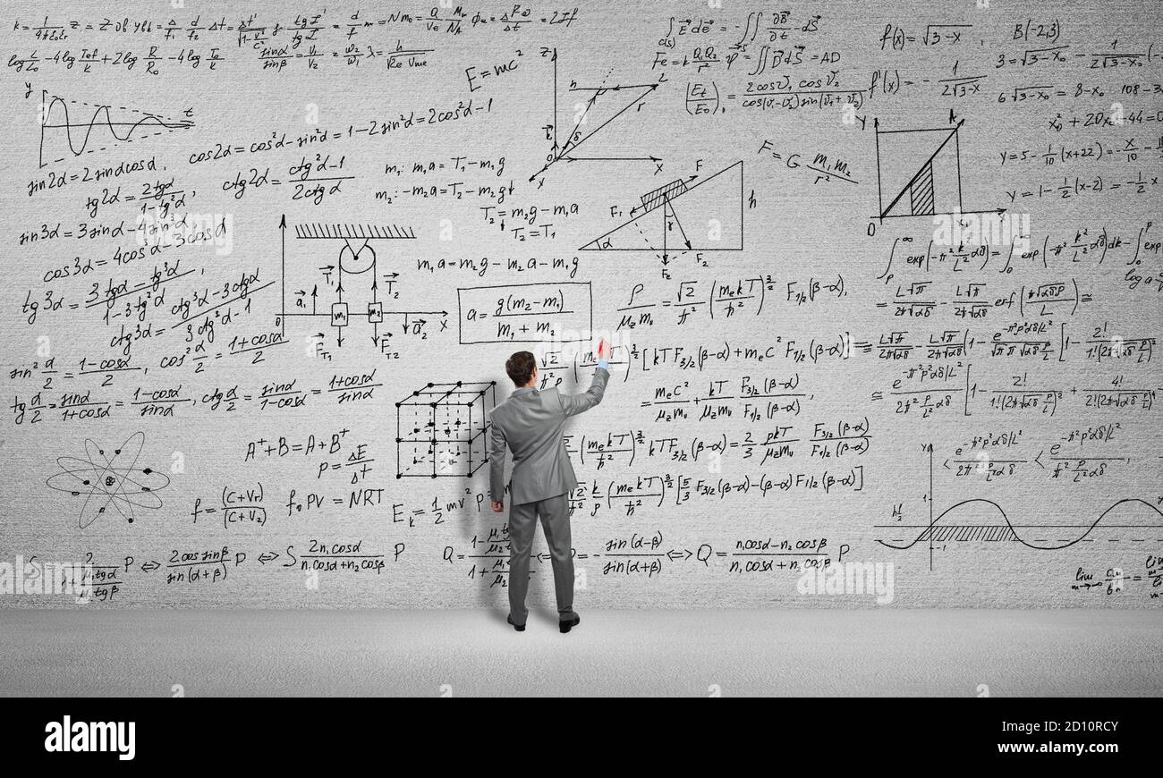 Man draw science formulas Stock Photo - Alamy