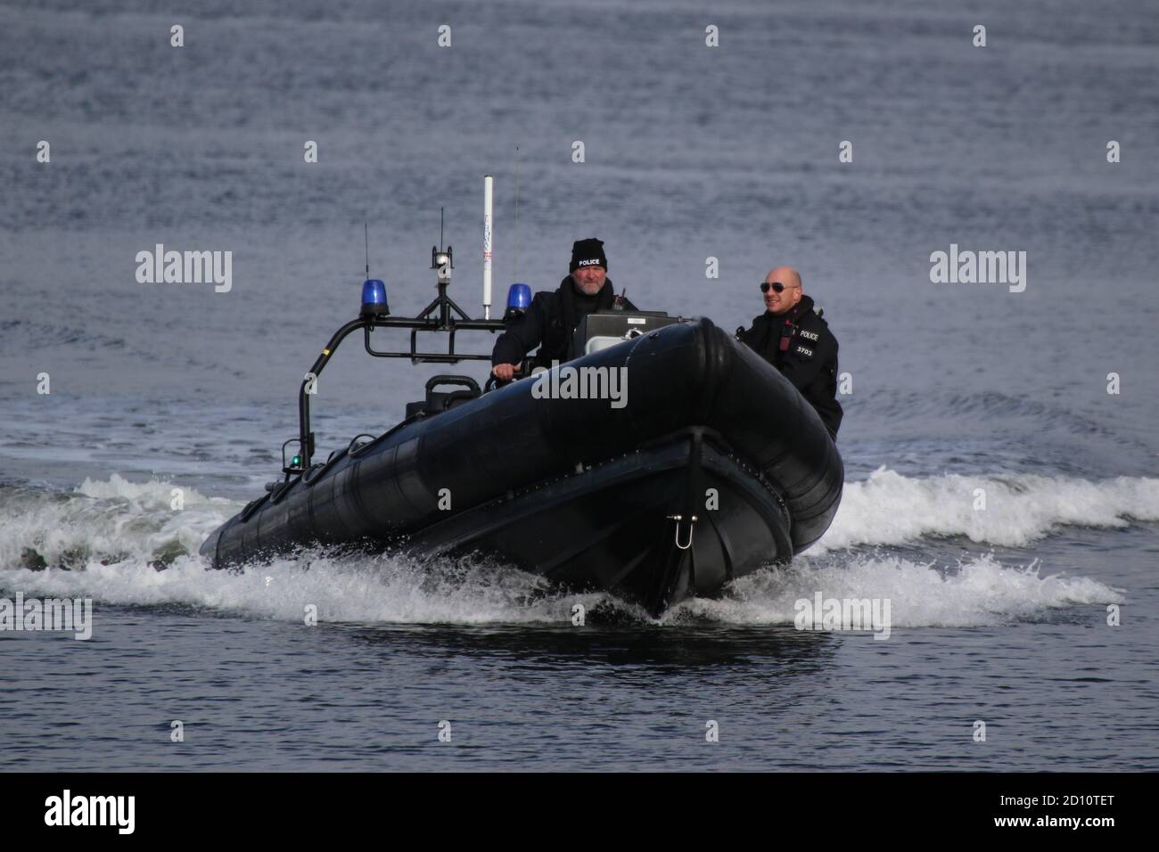 A Ministry of Defence Police RIB escorts the Royal Canadian Navy ...