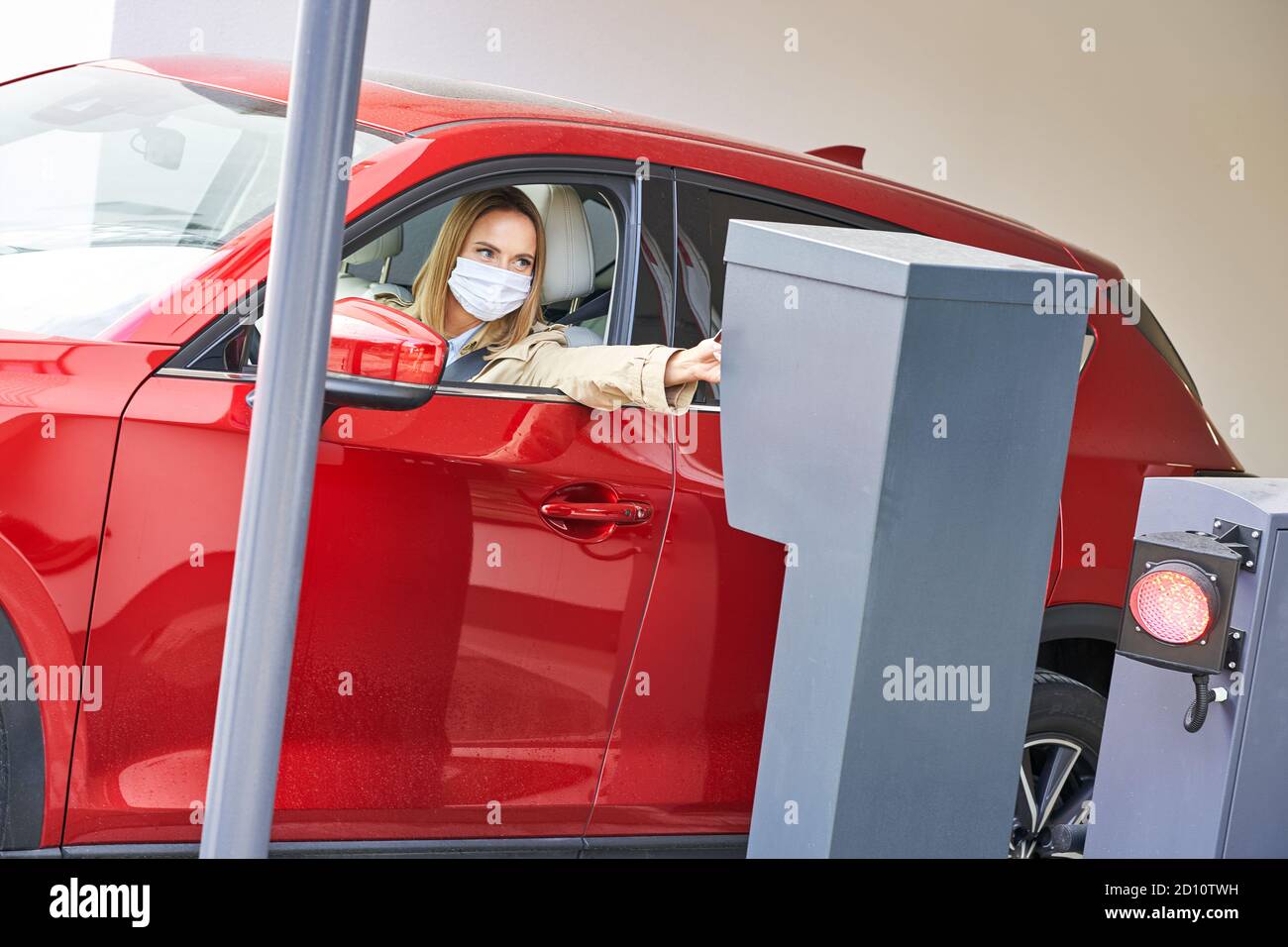 Woman using parking meter hi-res stock photography and images - Alamy