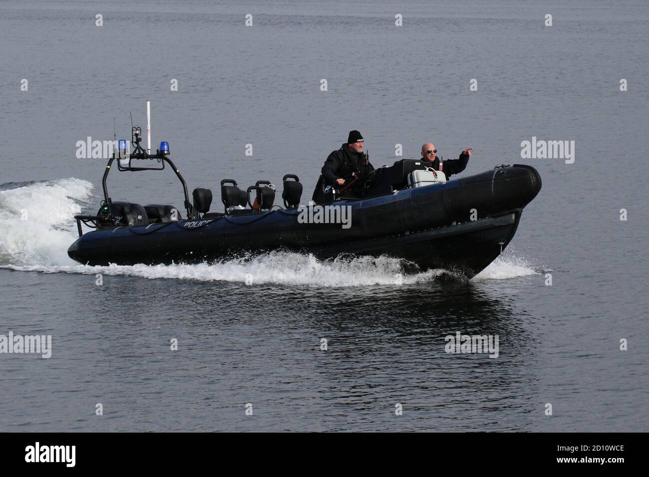 A Ministry of Defence Police RIB escorts the Royal Canadian Navy ...