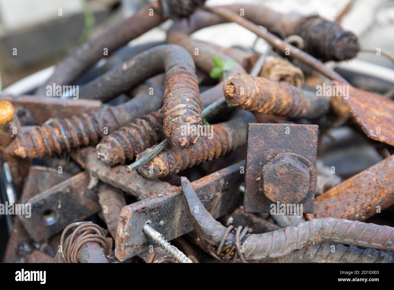 Scrap metal stack. fittings, screws, parts and wires. Waste sorting and ...