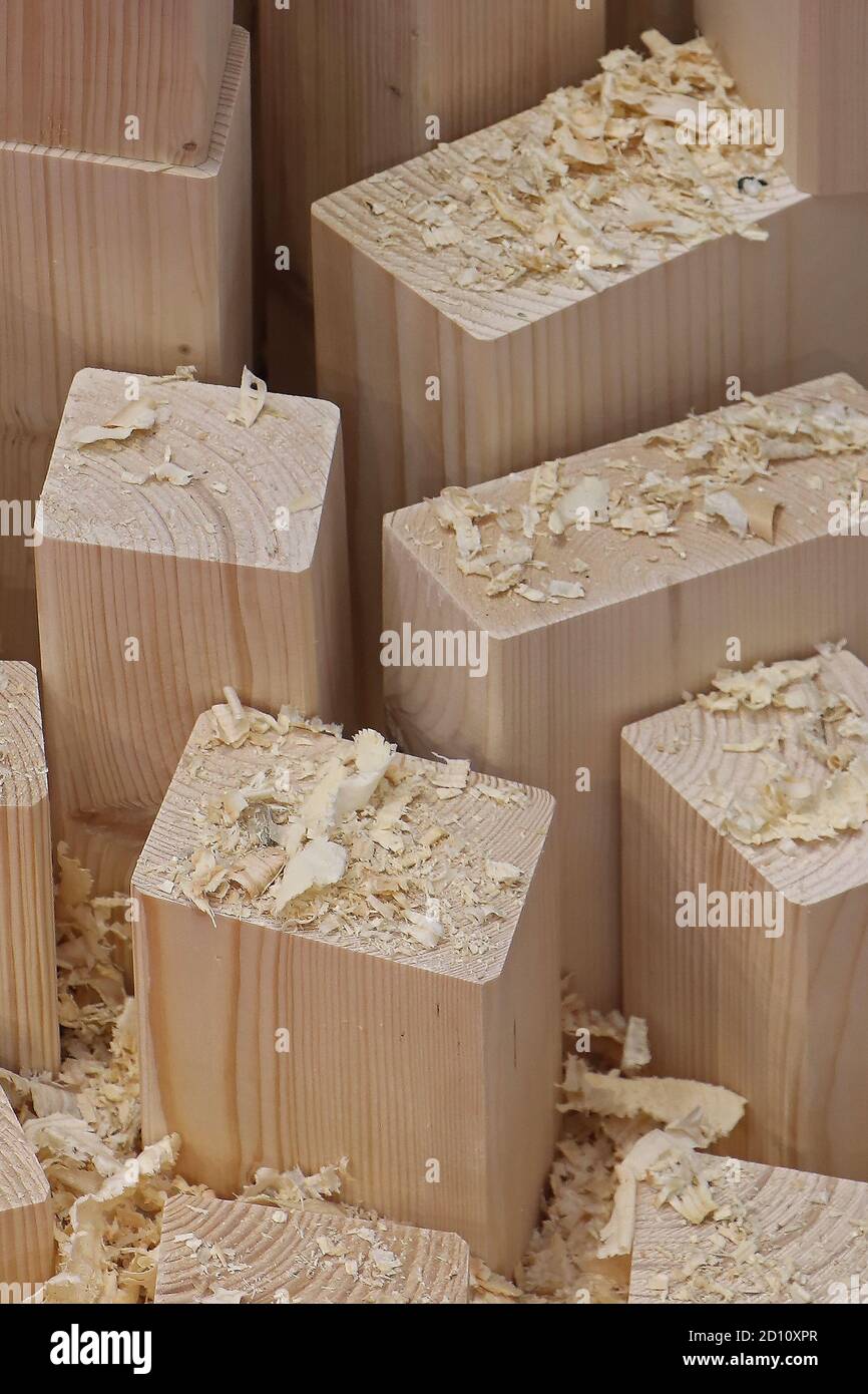 Fresh wooden pieces with small shaved parts Stock Photo - Alamy