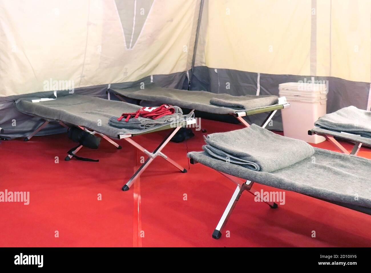 Temporary hospital medical accommodation interior with beds and ...