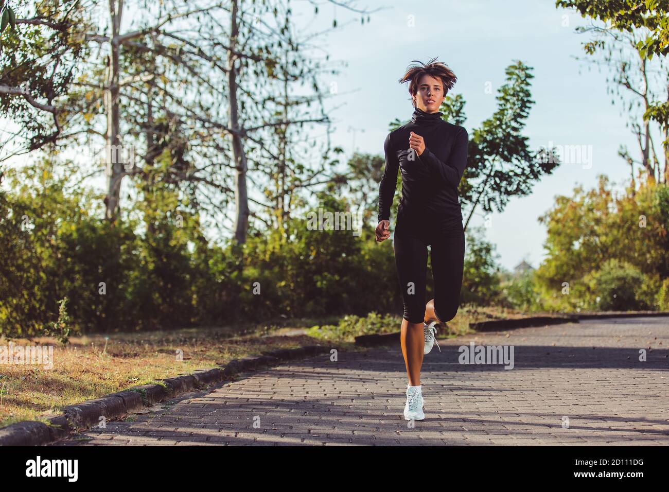 beautiful girl running in the park. High quality photo Stock Photo - Alamy