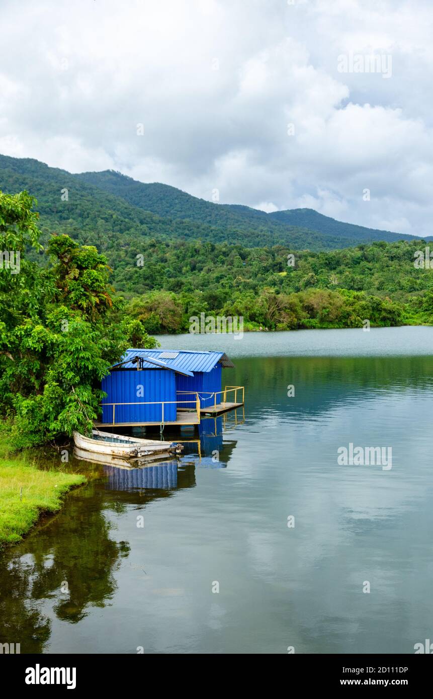 Serene view of Chapoli dam reservoir during monsoon season in Canacona ...