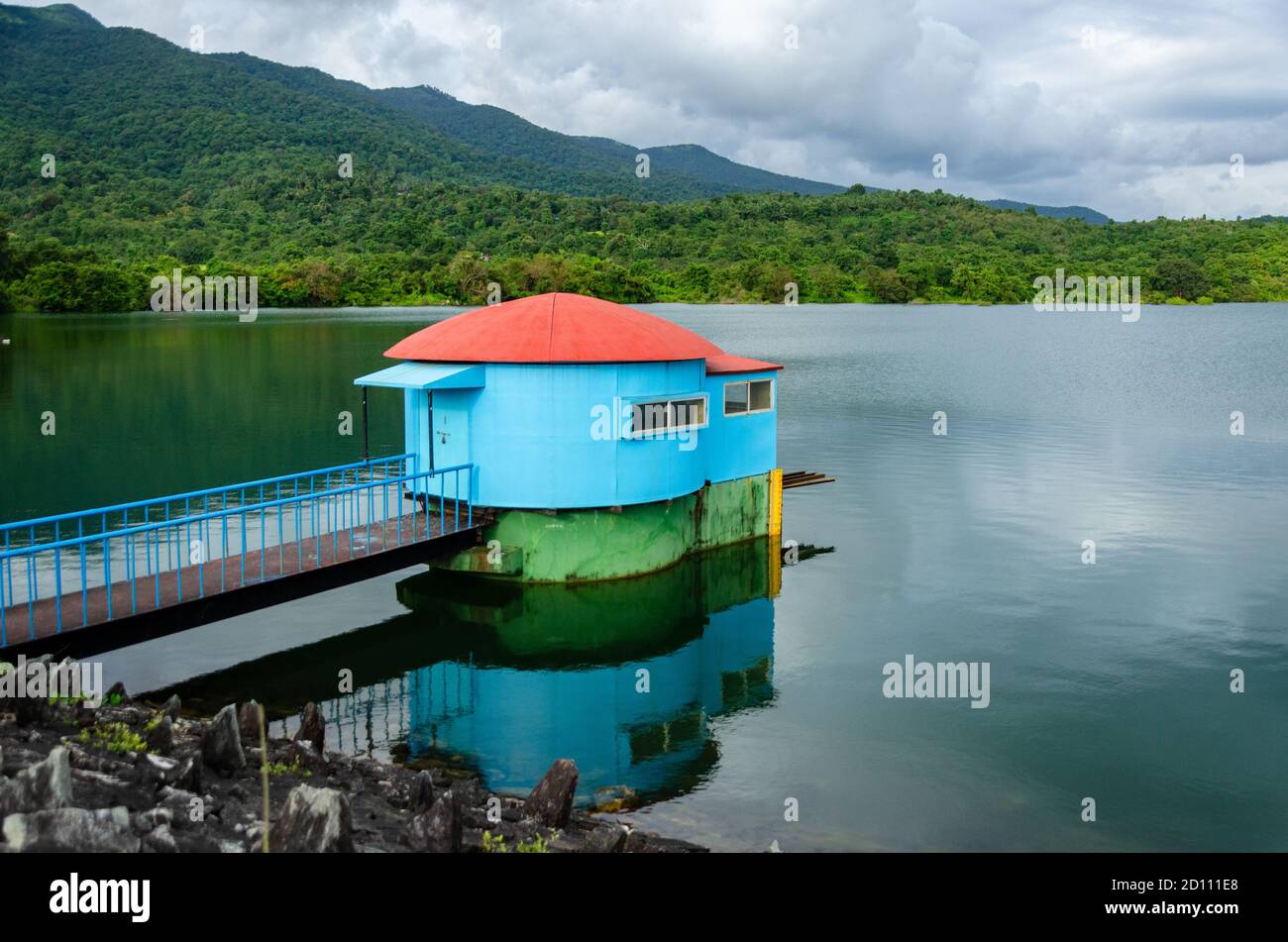 Serene view of Chapoli dam reservoir during monsoon season in Canacona ...