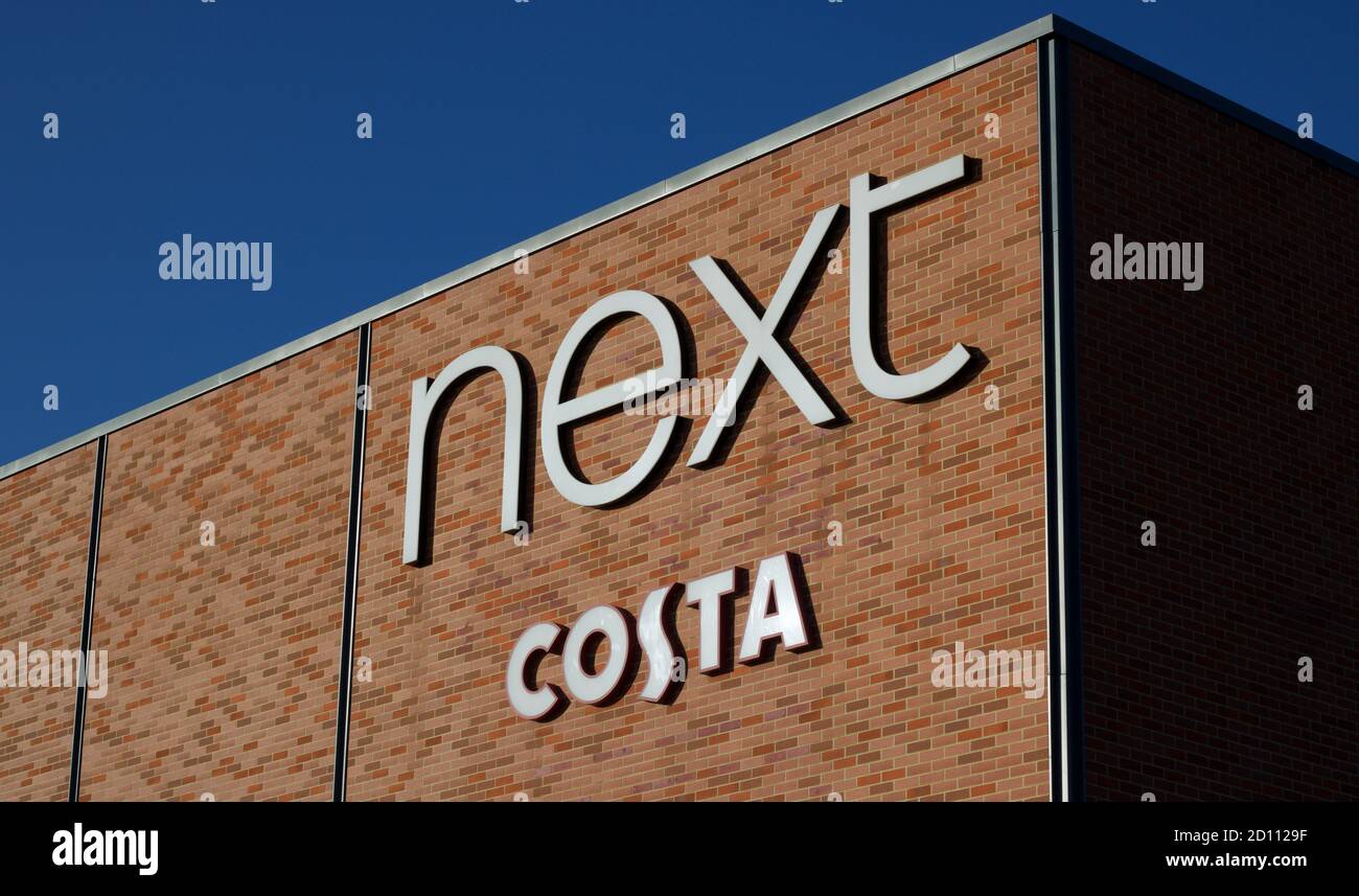 26 September 2020 - UK: Building showing Next and Costa branding with ...