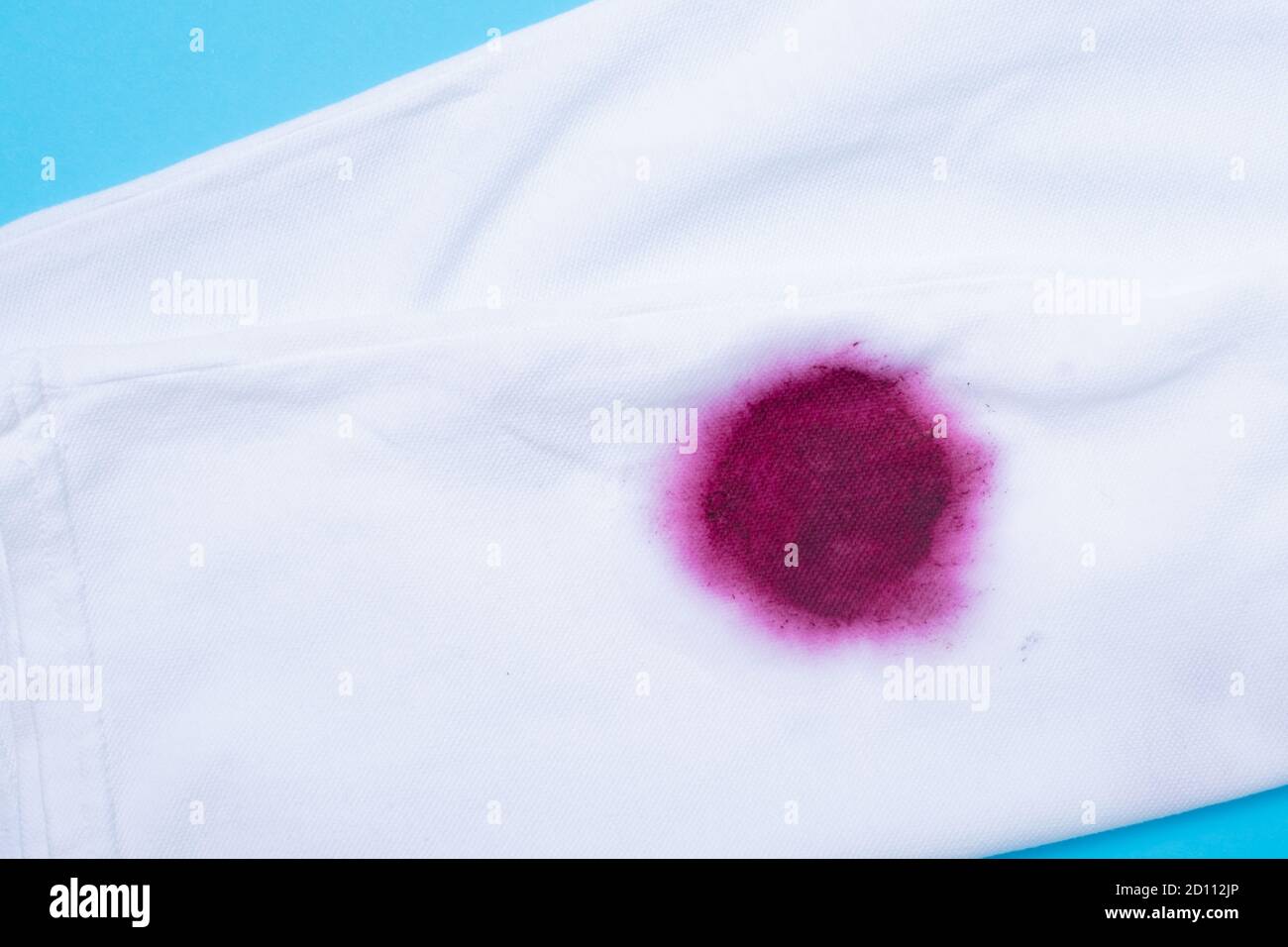 close up of a pink spot on clothes.daily life dirty stain for wash and ...