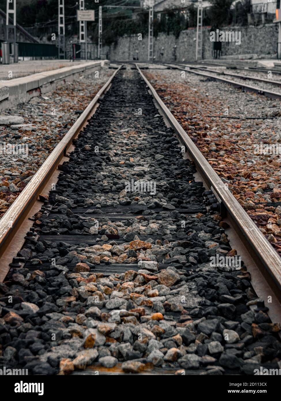 Vertical shot of an old rusty railroad track on ballast Stock Photo - Alamy
