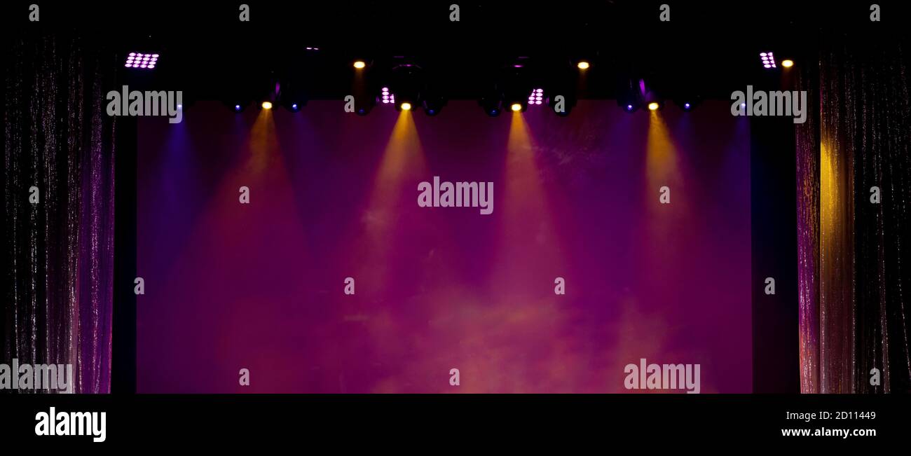 Theater before the performance of artists. Bright colored light and ...