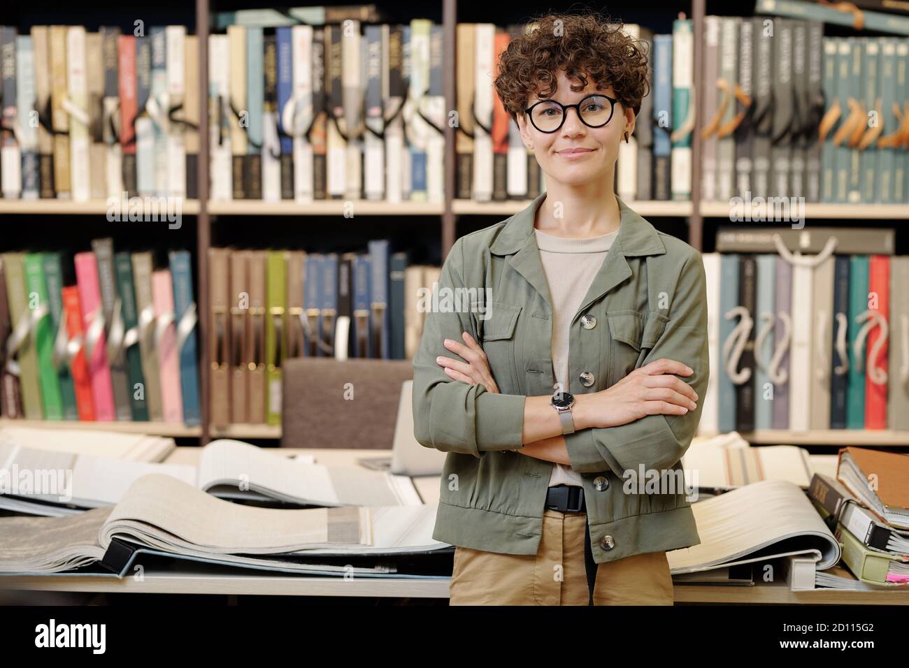 Young confident manager of interior design studio working with new ...