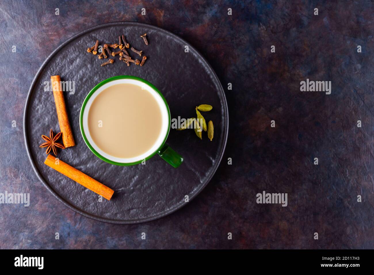 Masala chai tea. Traditional indian drink - masala tea with various ...