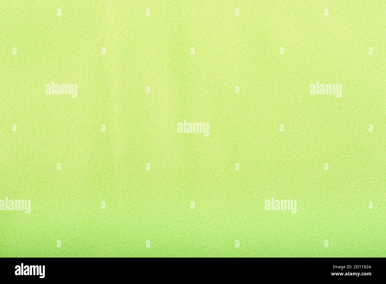 Green lint-free fabric as background or texture. Close up. Top view ...