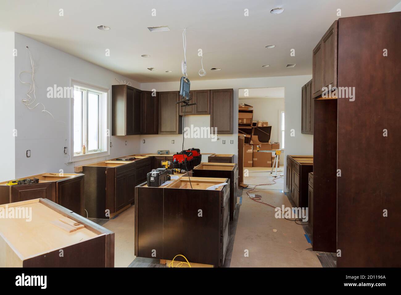 Installing new modern kitchen of preparing to custom installation ...