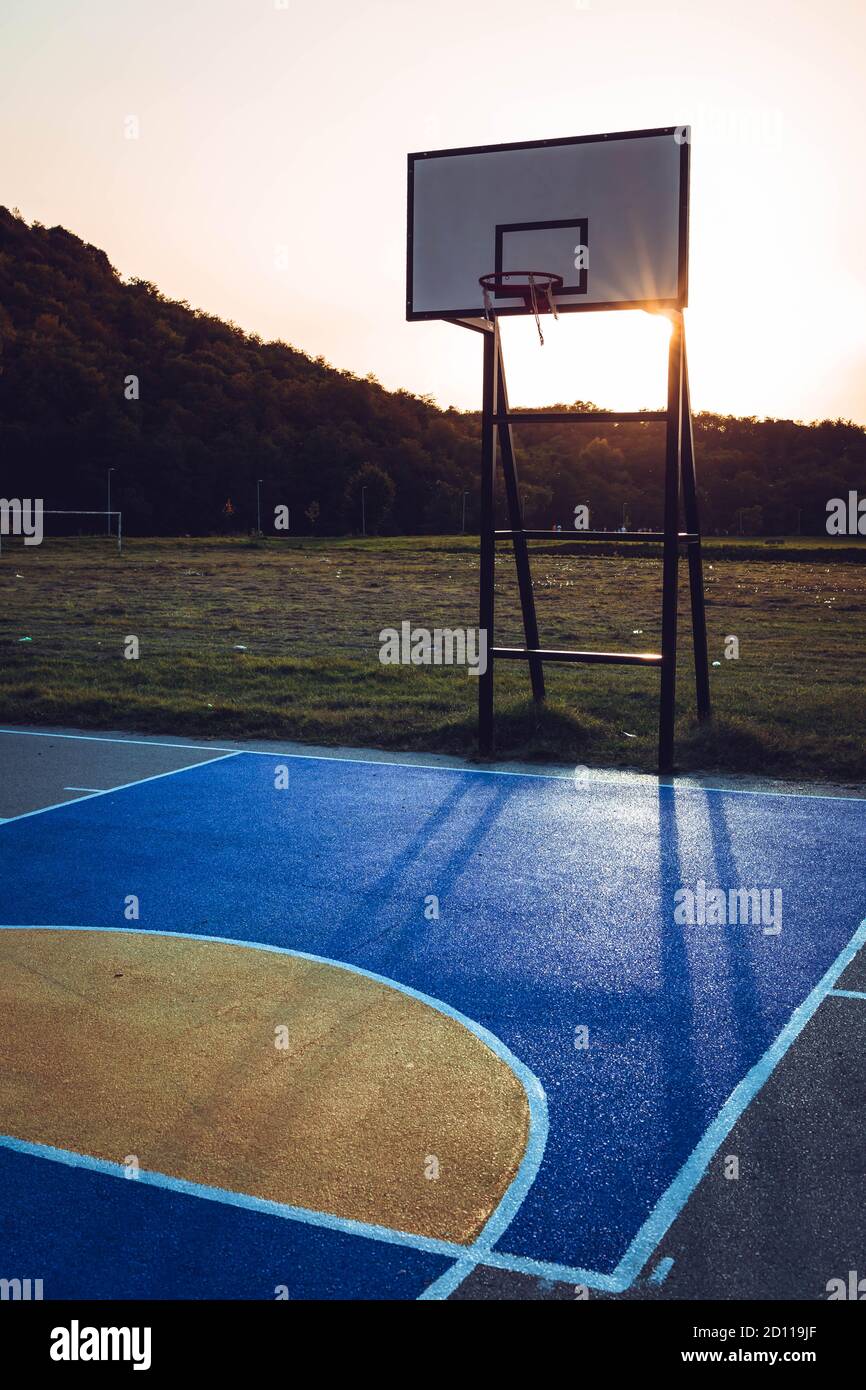 Basketball hoop in the afternoon light. Sport activities, healthy ...
