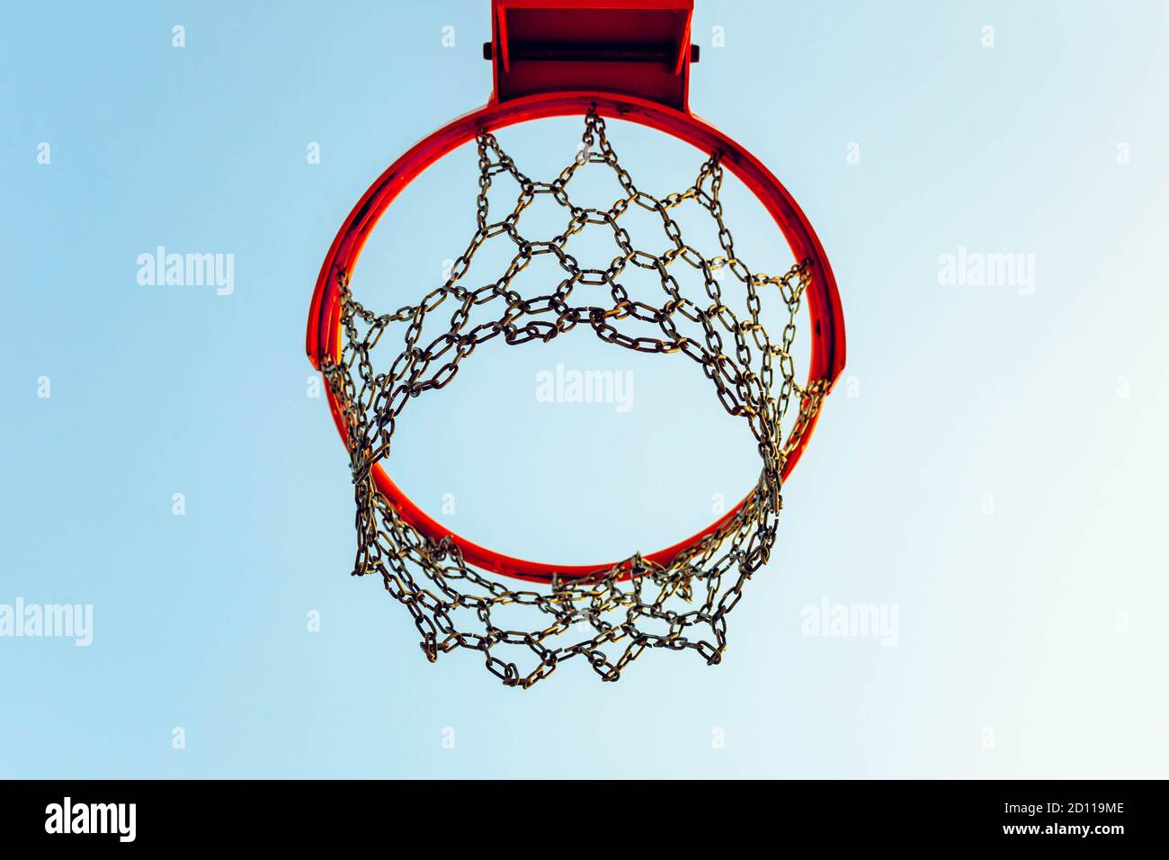 Bottom view of red basketball hoop. Copy space Stock Photo - Alamy