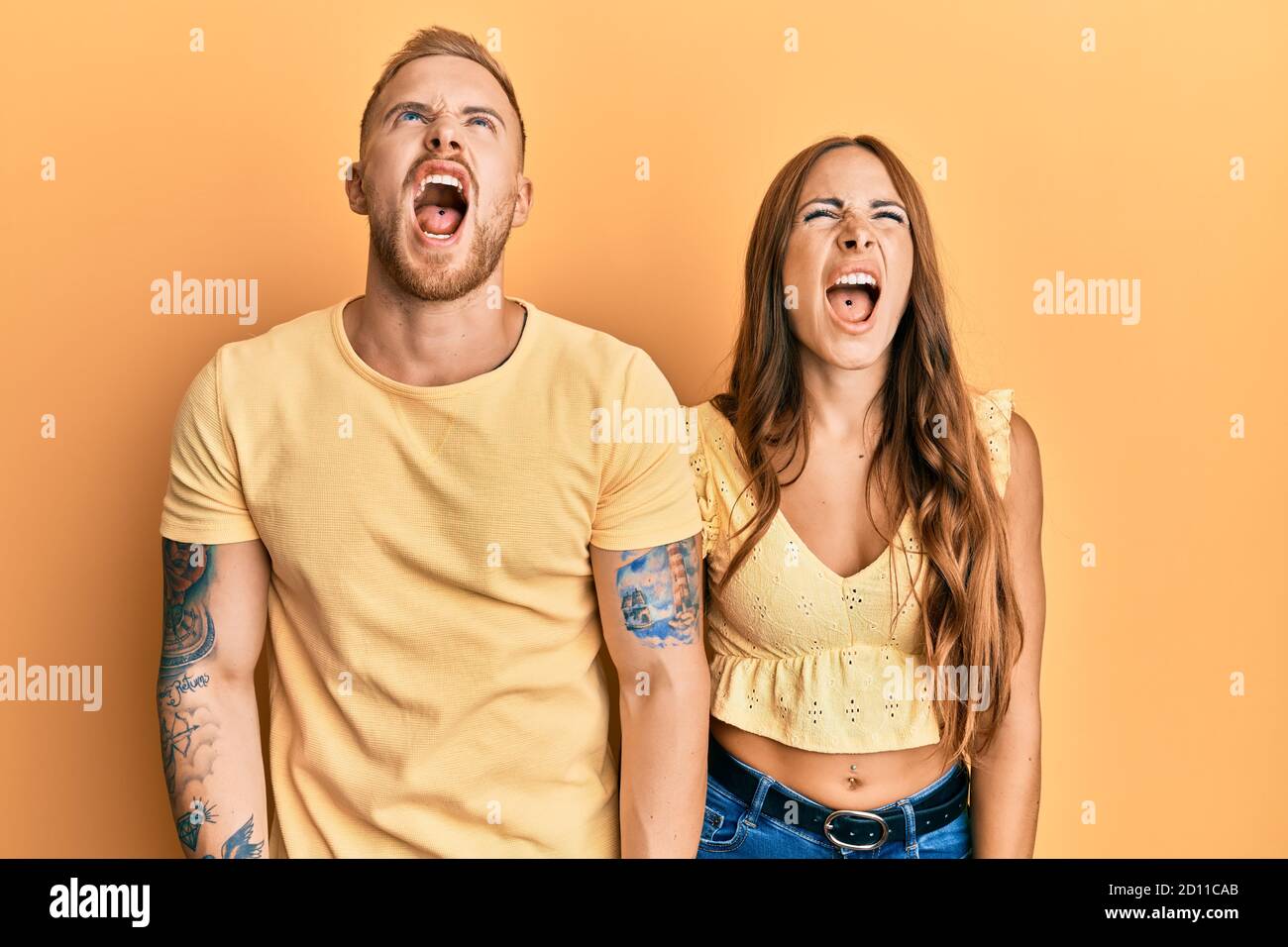 Young couple of girlfriend and boyfriend hugging and standing together ...