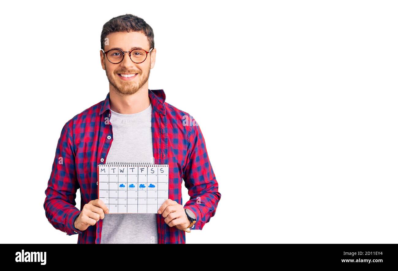 Man showing calendar Cut Out Stock Images & Pictures - Alamy