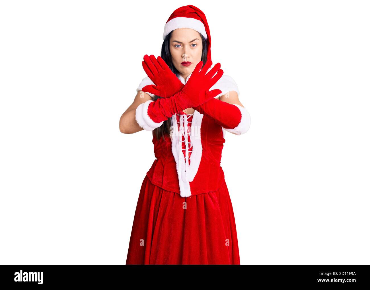 Young beautiful caucasian woman wearing santa claus costume rejection ...