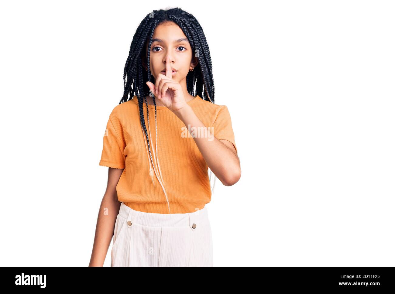 Cute african american girl wearing casual clothes asking to be quiet ...