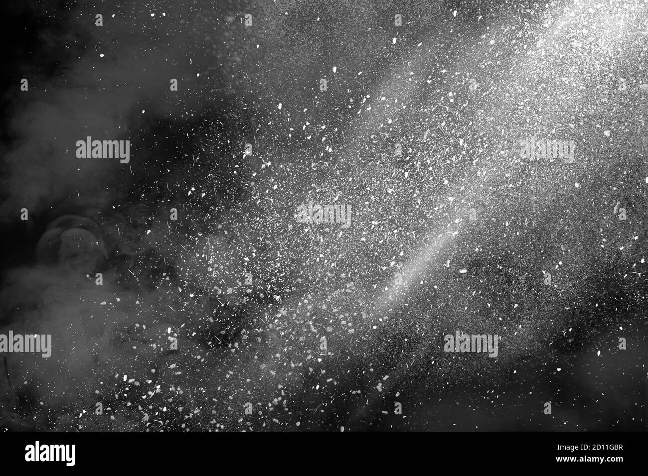 Freeze motion of white powder exploding, isolated on black, dark ...