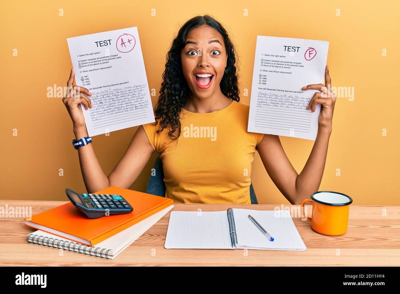 Young african american girl showing failed and passed exam celebrating ...