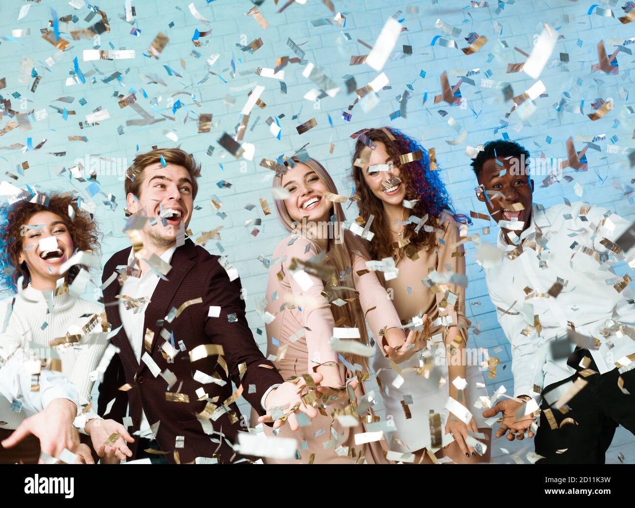 Happy Friends Having Fun Partying Enjoying Falling Confetti Indoor ...