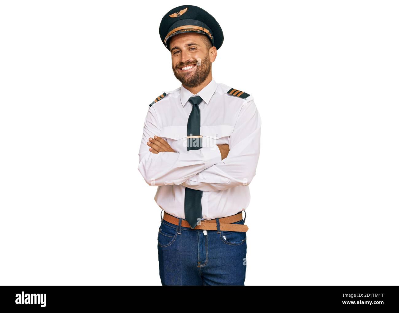 Handsome man with beard wearing airplane pilot uniform happy face ...