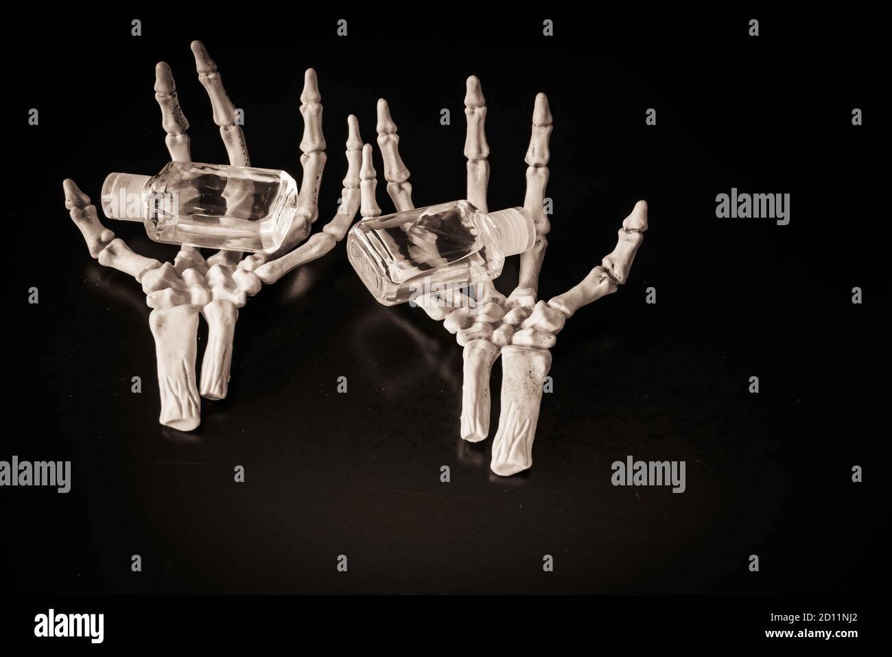 Skeleton Claw Hand holding bottles of Hand Sanitzer during Halloween ...