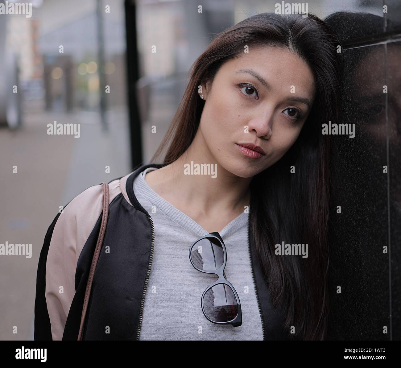 Pretty Asian girl in an urban aera Stock Photo - Alamy