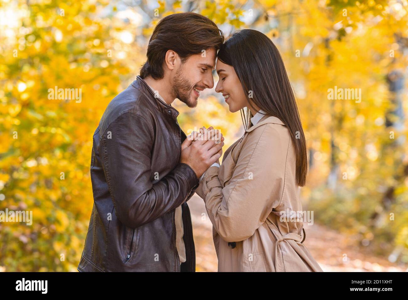 Man in love making confession to his girlfriend in forest Stock Photo ...
