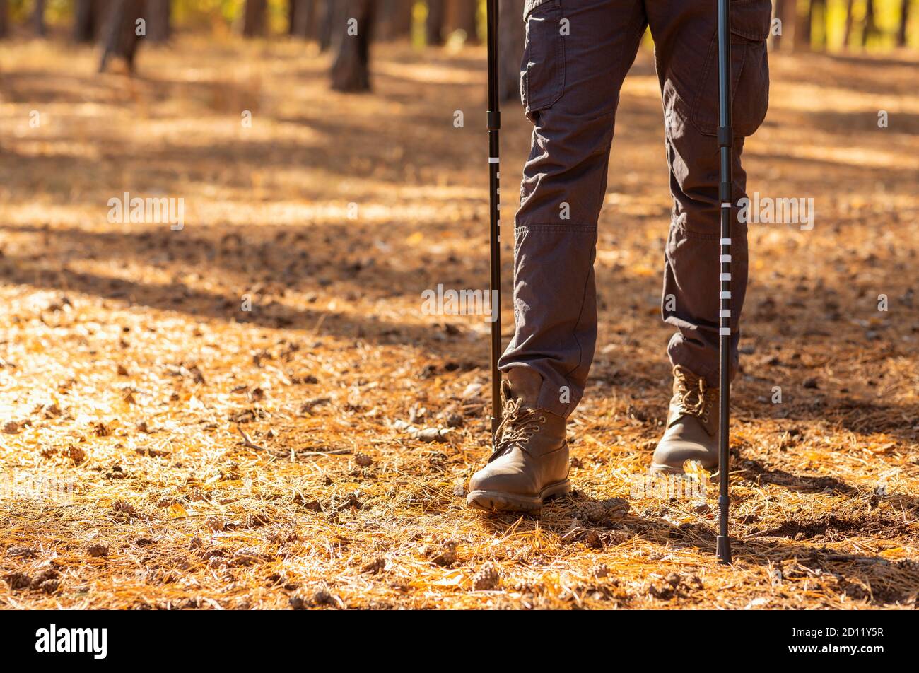 Hiking man backpack sticks hi-res stock photography and images - Alamy
