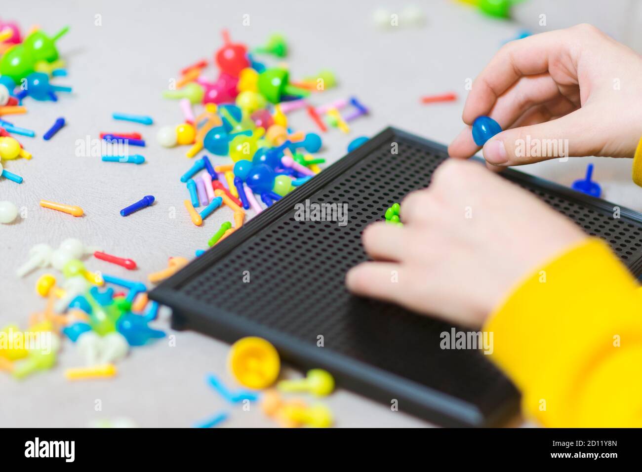 Pegboard child hi-res stock photography and images - Alamy