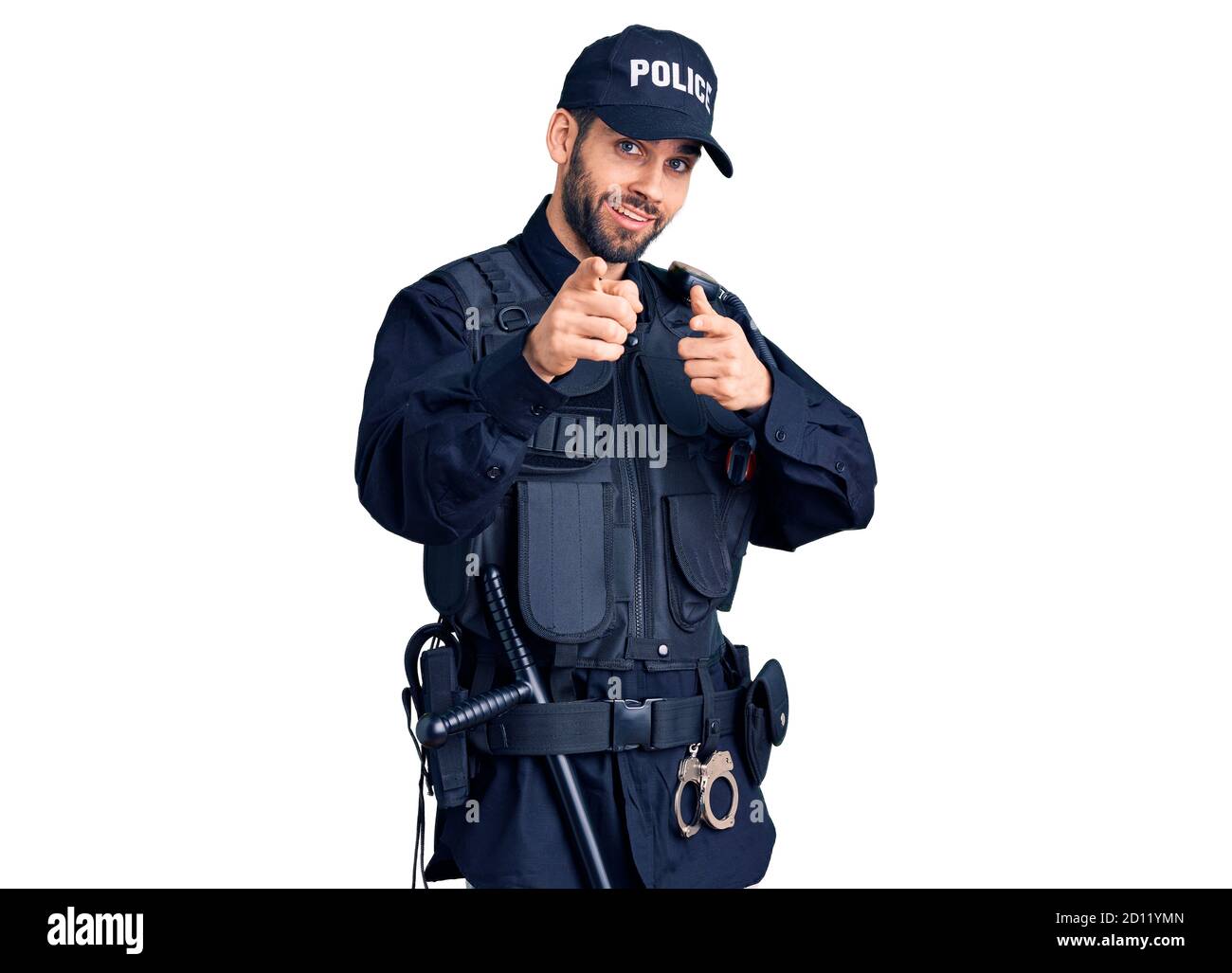 Young handsome man with beard wearing police uniform pointing fingers ...