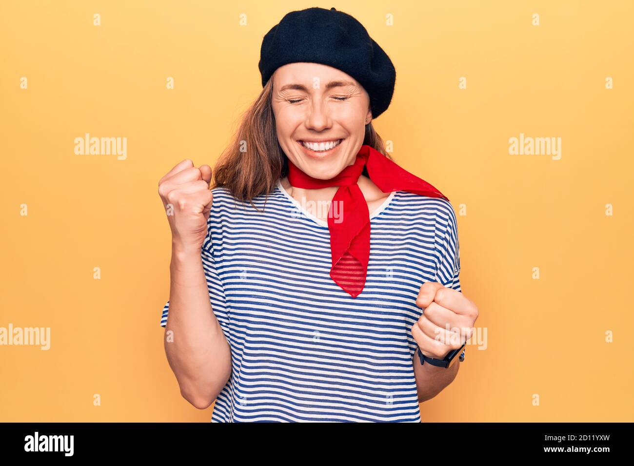 Young beautiful blonde woman wearing french fashion style with scarf ...