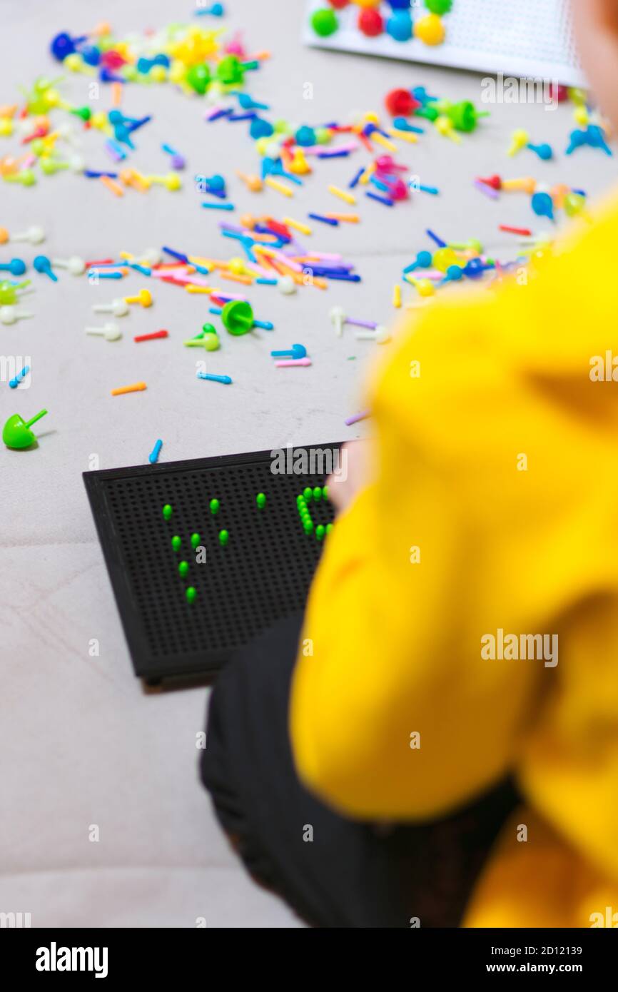 Pegboard child hi-res stock photography and images - Alamy