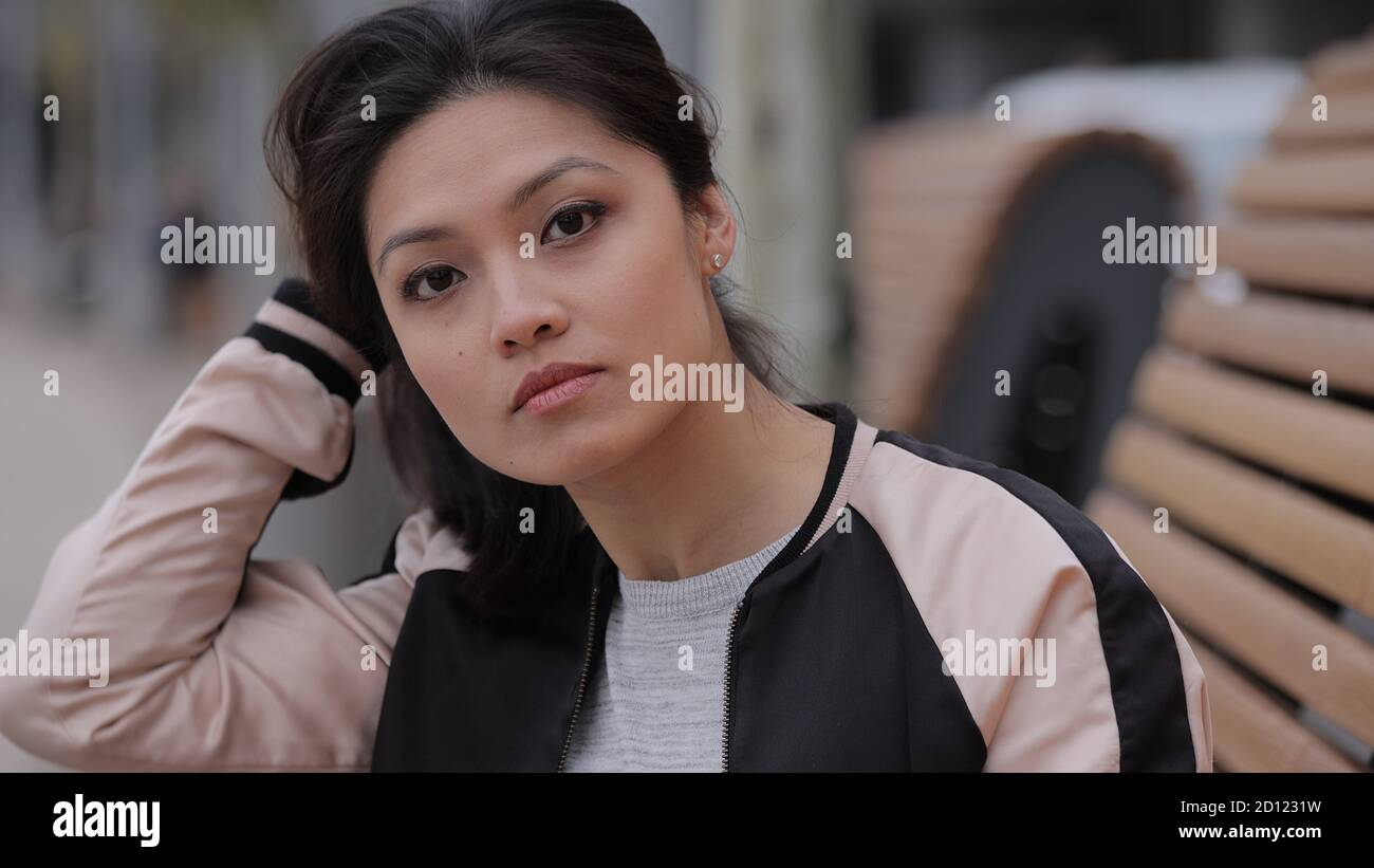 Pretty Asian girl in an urban aera Stock Photo - Alamy