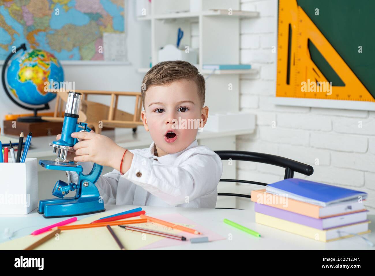 School concept. Pupil in class. Cute boy in elementary school Stock ...