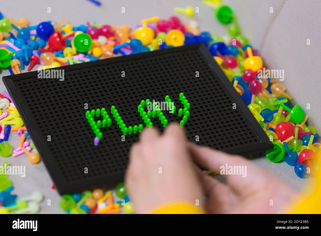 Pegboard child hi-res stock photography and images - Alamy