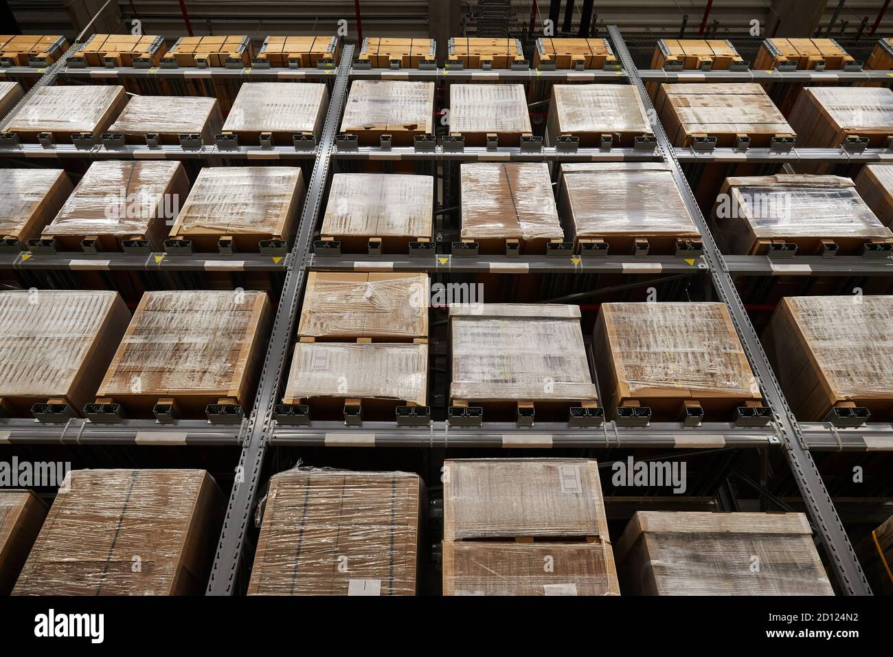 Warehouse with stocked shelves of boxes Stock Photo - Alamy