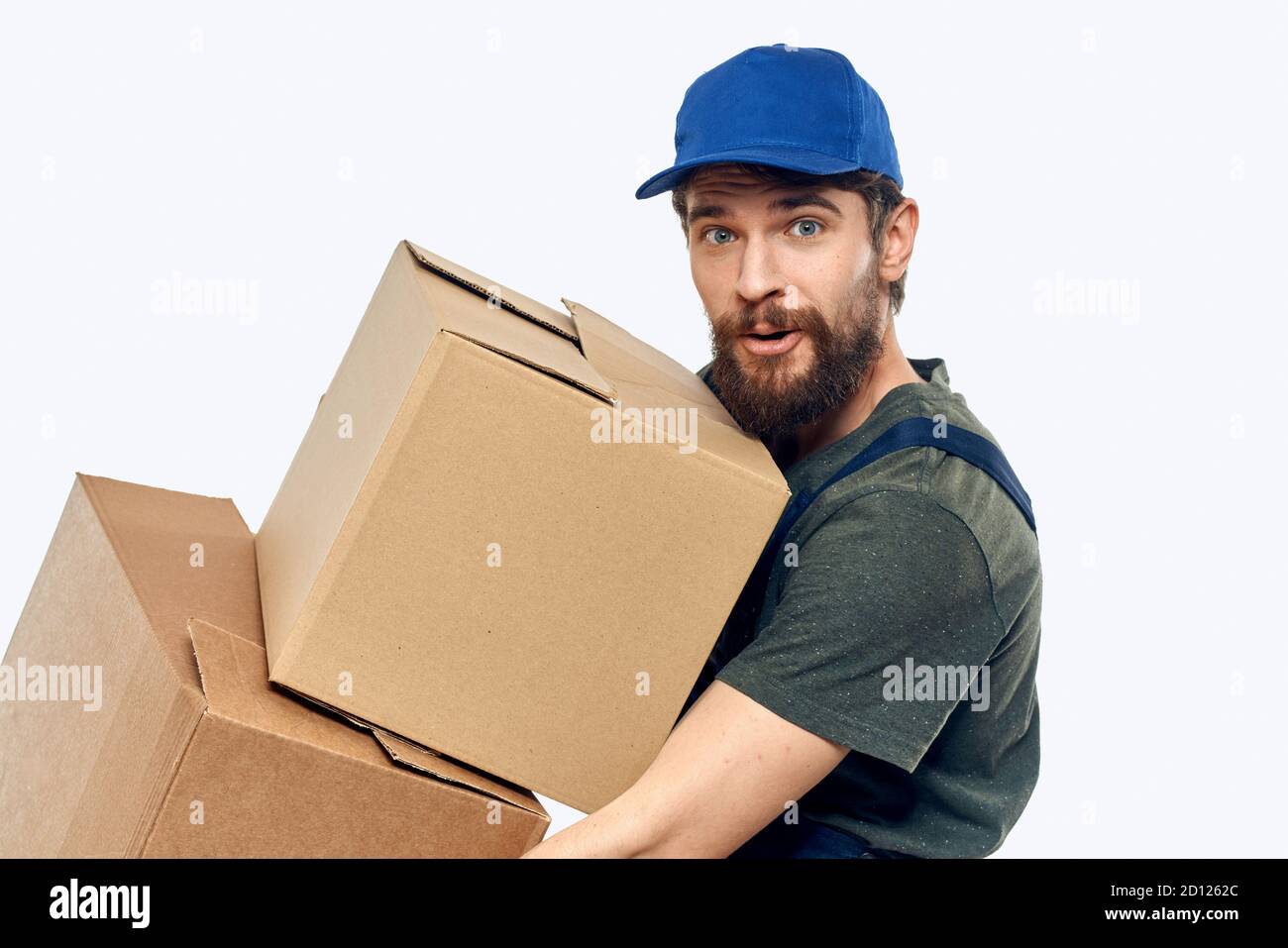 Working man with boxes in hands delivery service work lifestyle Stock ...
