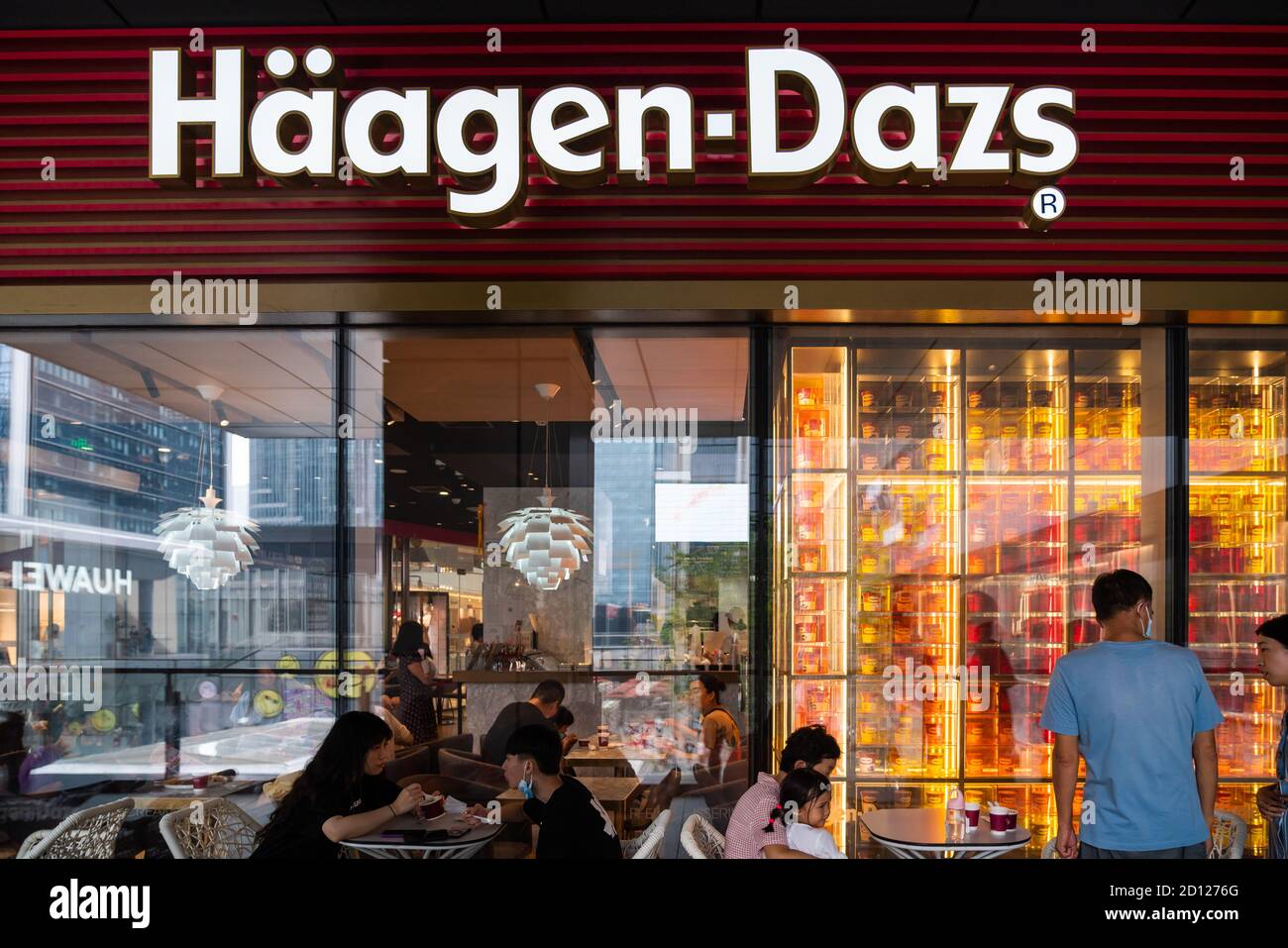 Customers are seen at an American ice cream brand Haagen-Dazs store in ...