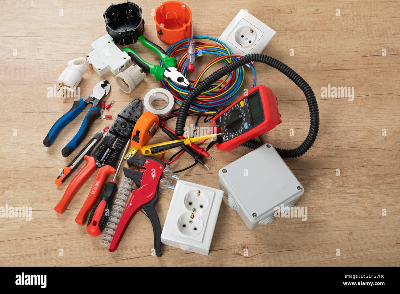 Tools for electrician needs: voltage testers, wire strippers, pliers ...