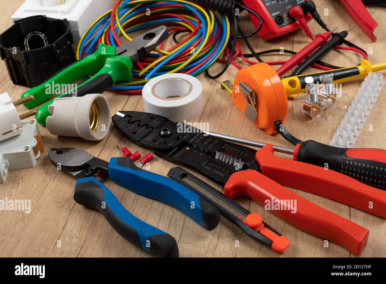 Tools for electrician needs: voltage testers, wire strippers, pliers ...