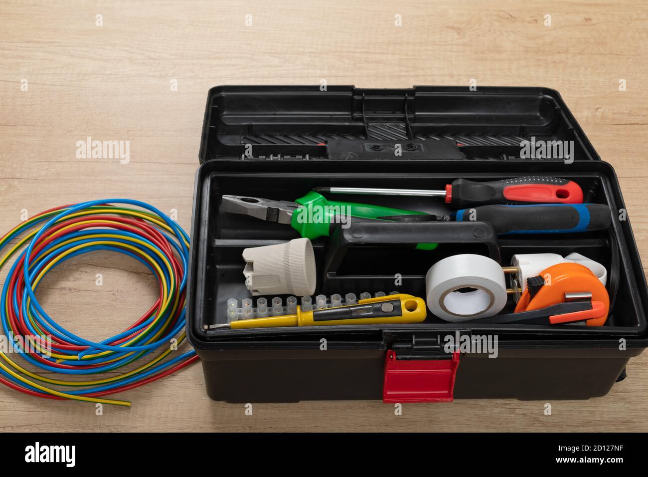 Tools for electrician needs: voltage testers, wire strippers, pliers ...